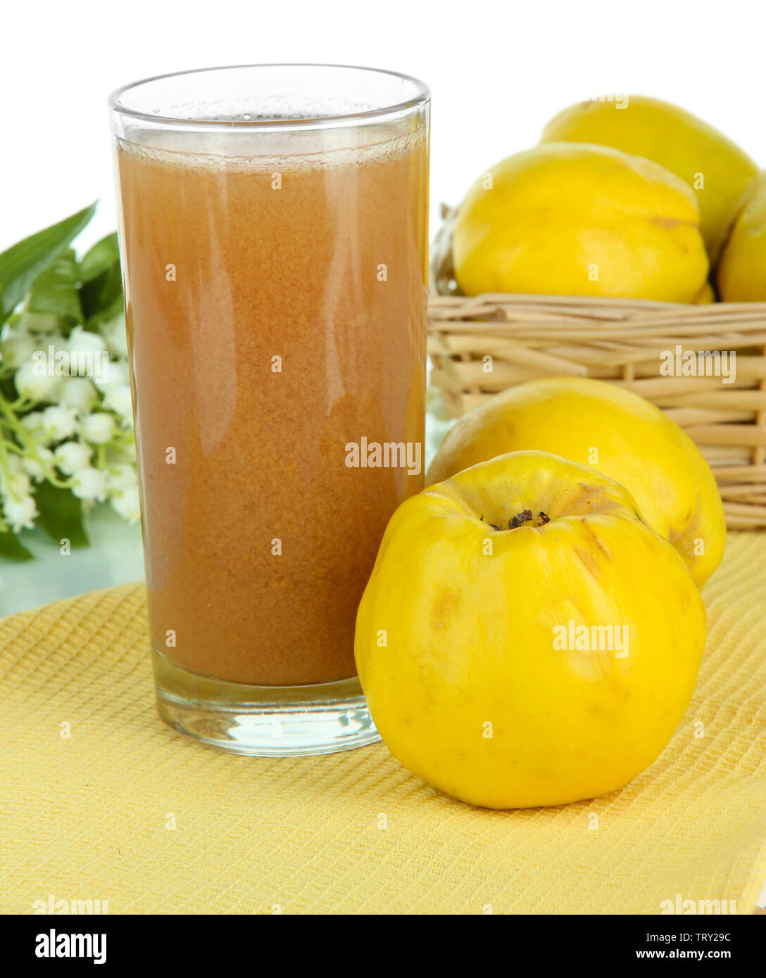 Sweet quince with juice on table on white background Stock Photo - Alamy