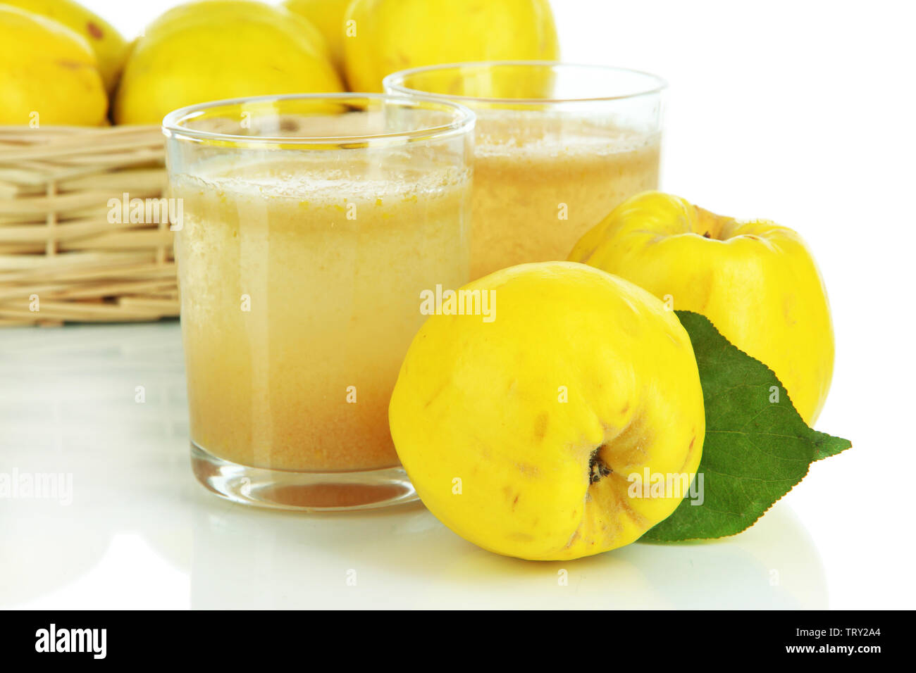 Sweet quince with juice isolated on white Stock Photo - Alamy