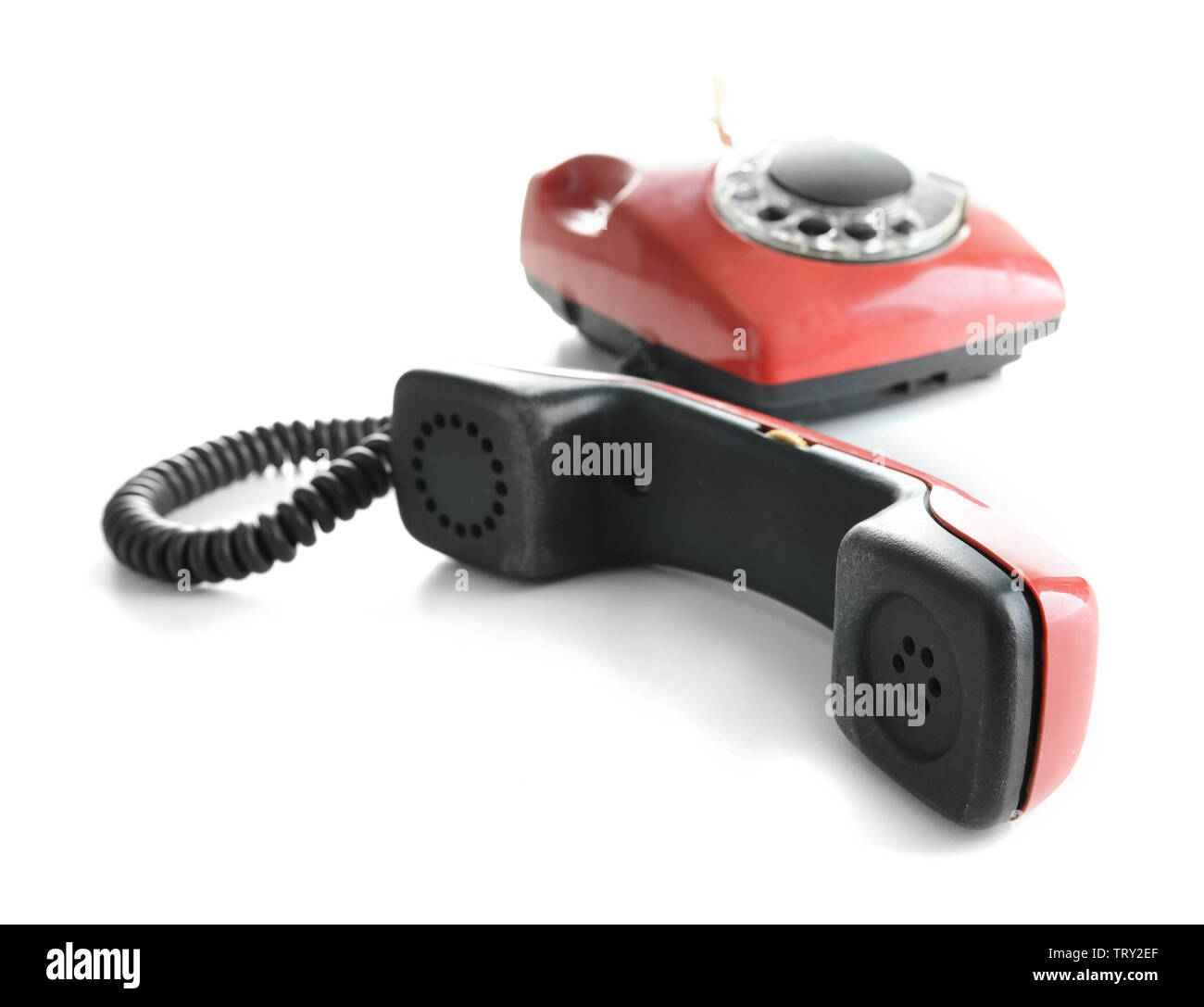 Red retro telephone, isolated on white Stock Photo - Alamy