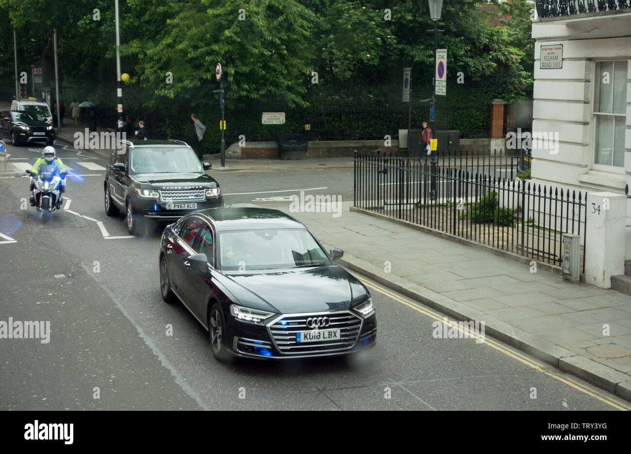Royalty and Specialist Protection motorcycle outriders escorting a ...