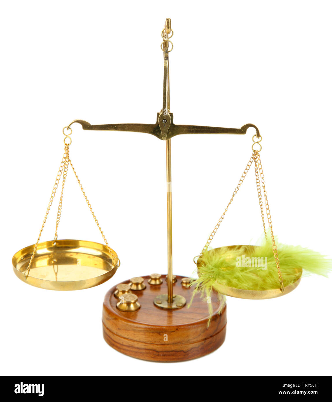 Balance scale with feather isolated on white Stock Photo - Alamy