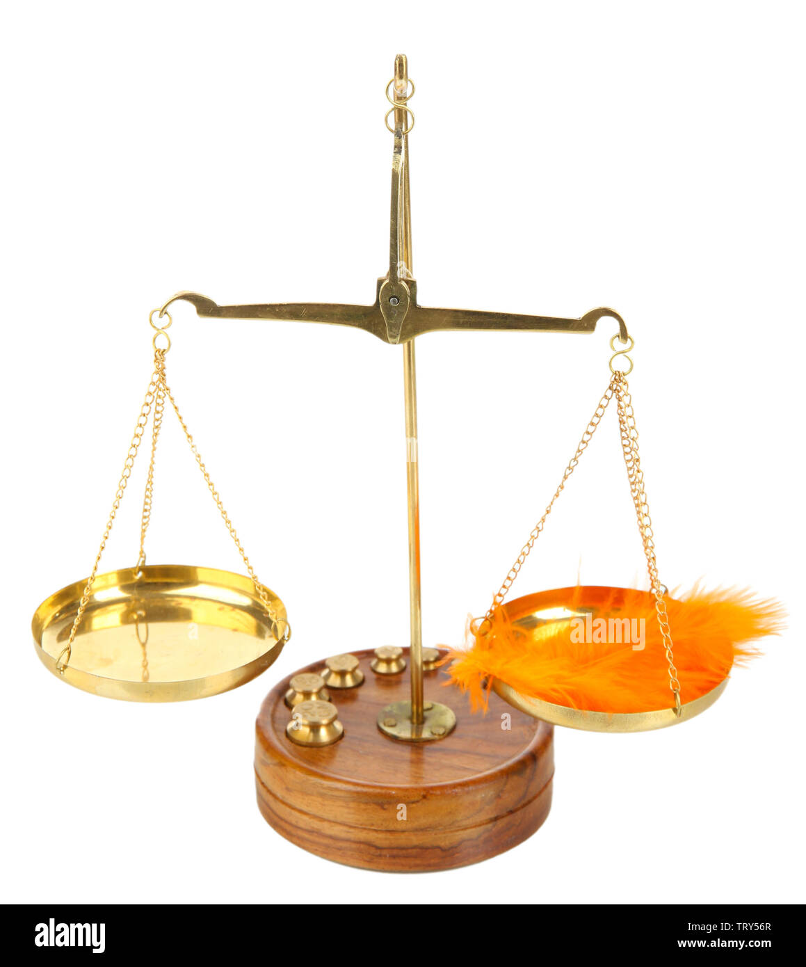 Balance scale with feather isolated on white Stock Photo - Alamy