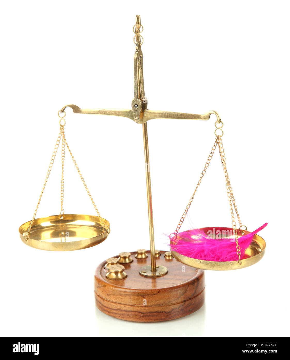 Balance scale with feather isolated on white Stock Photo - Alamy