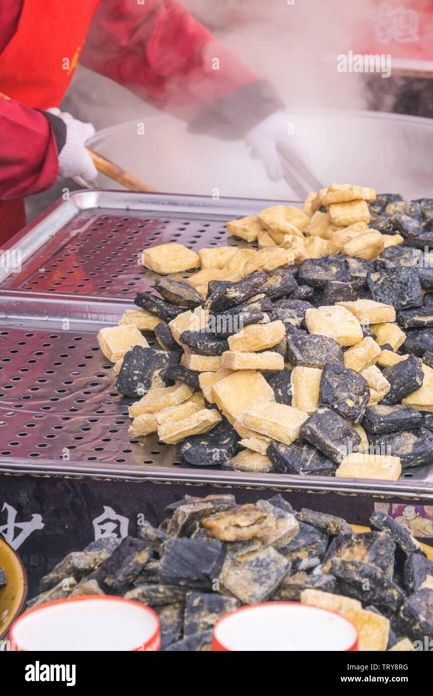 Hunan snack fried stinky tofu Stock Photo - Alamy