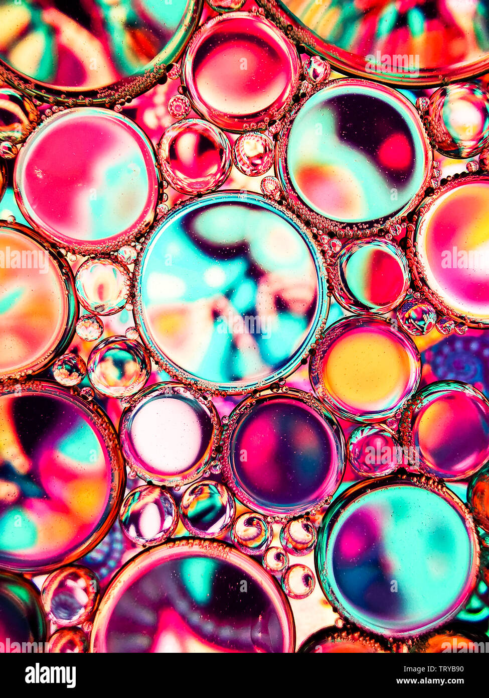 magenta cyan oil bubbles abstract textures Stock Photo - Alamy
