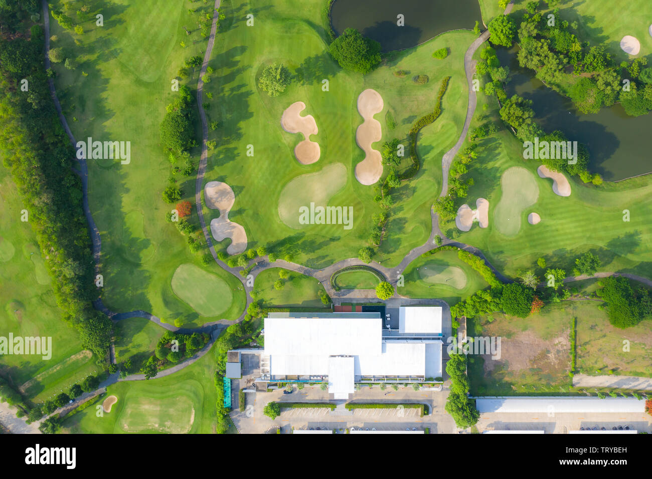 Aerial panoramic view of golf course and houses in city Stock Photo - Alamy
