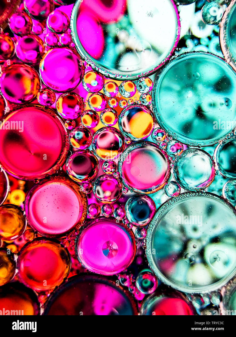 magenta cyan oil bubbles abstract textures Stock Photo - Alamy