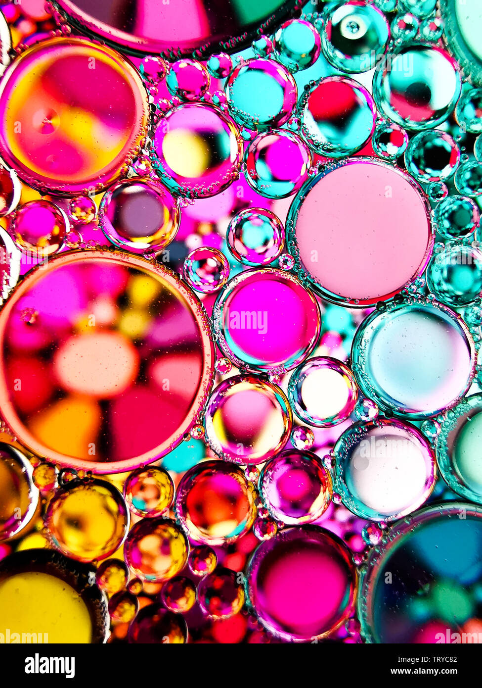 magenta cyan oil bubbles abstract textures Stock Photo - Alamy