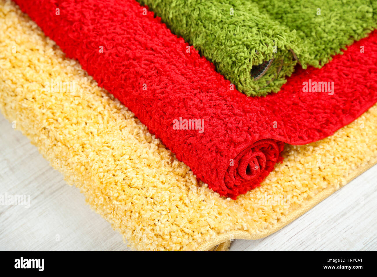 Many carpets of different colors close-up Stock Photo - Alamy