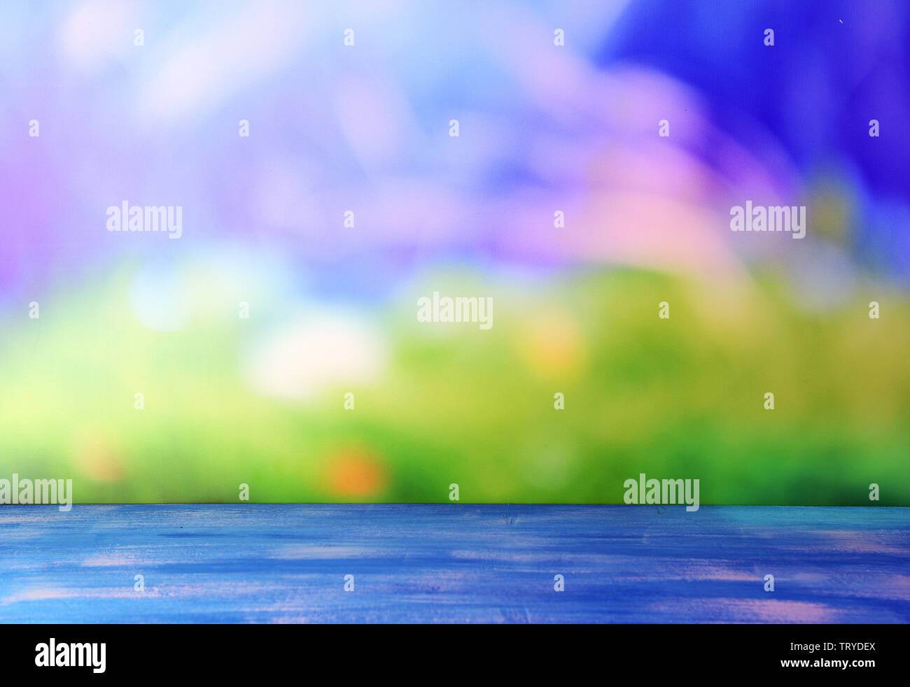 Color wooden board on bright background Stock Photo - Alamy