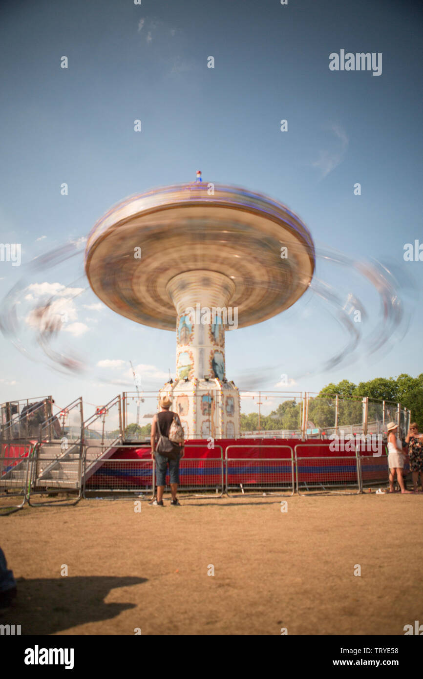 Vintage fairground swings hi-res stock photography and images - Alamy