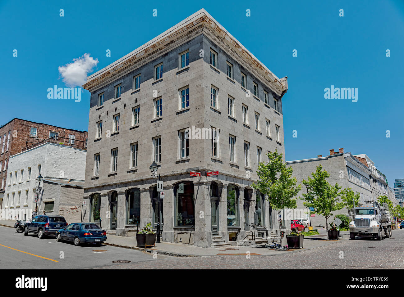 Square building in Old Montreal, Montreal Stock Photo - Alamy