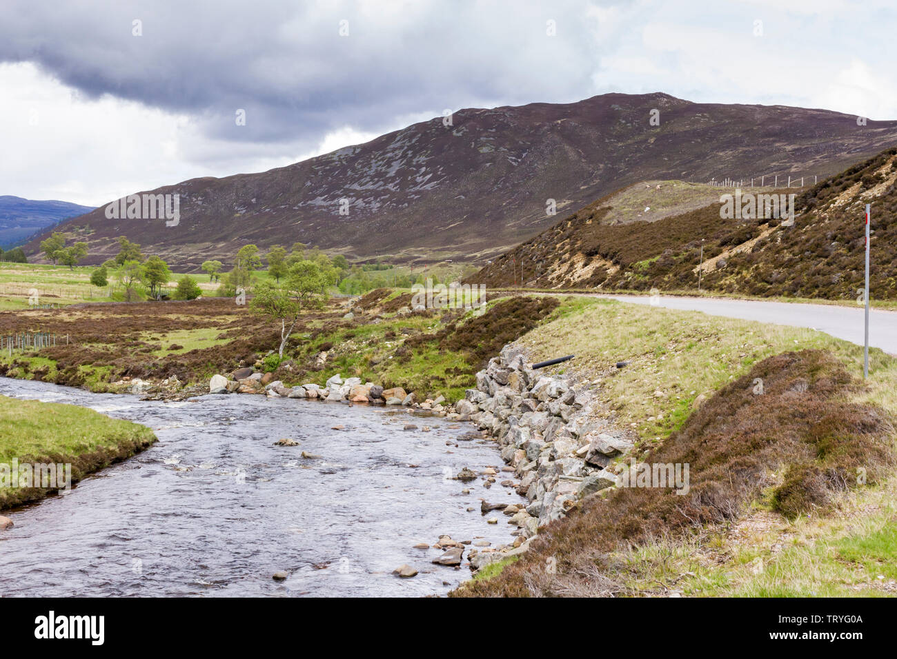 View of Clunie Water river and mountains in the Cairngorms ...