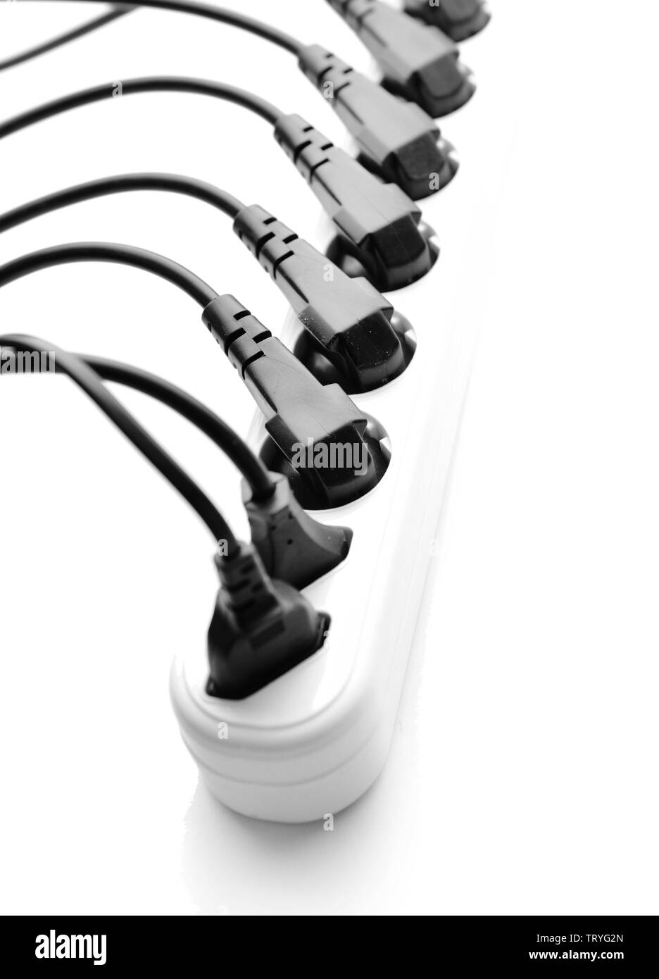 Overloaded power board, isolated on white Stock Photo - Alamy