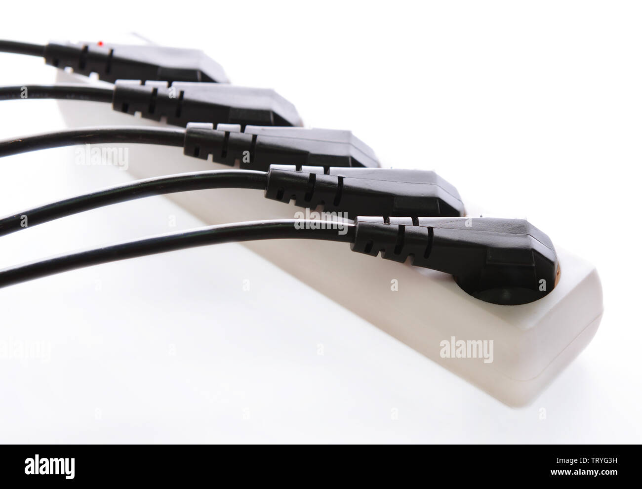 Overloaded power board, isolated on white Stock Photo - Alamy