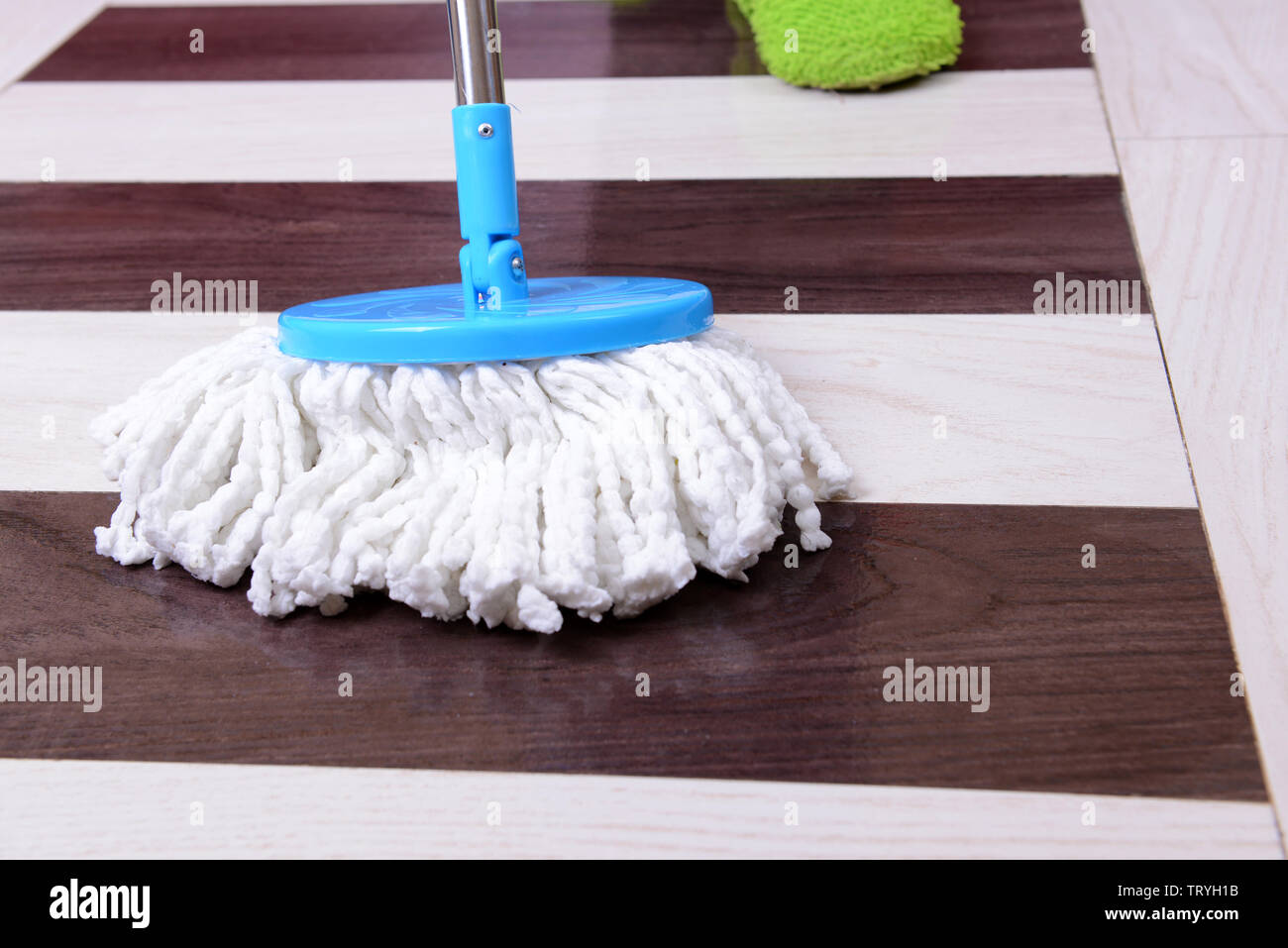 House cleaning with mop Stock Photo - Alamy