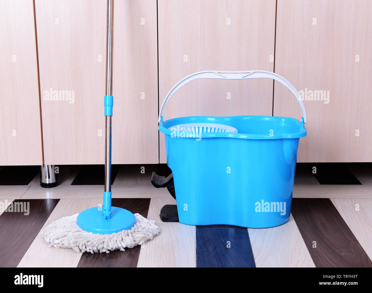 House cleaning with mop Stock Photo - Alamy