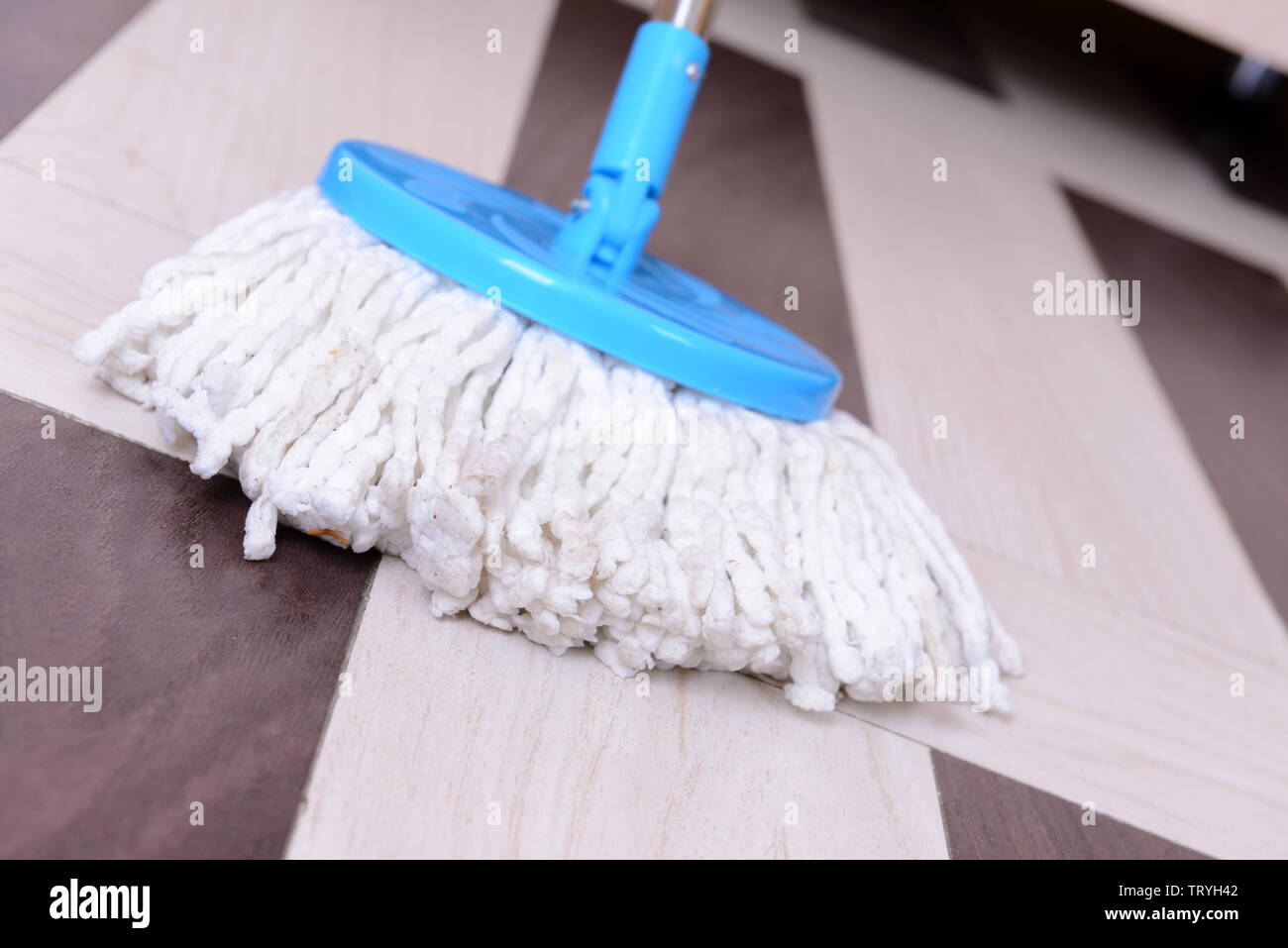 House cleaning with mop Stock Photo - Alamy