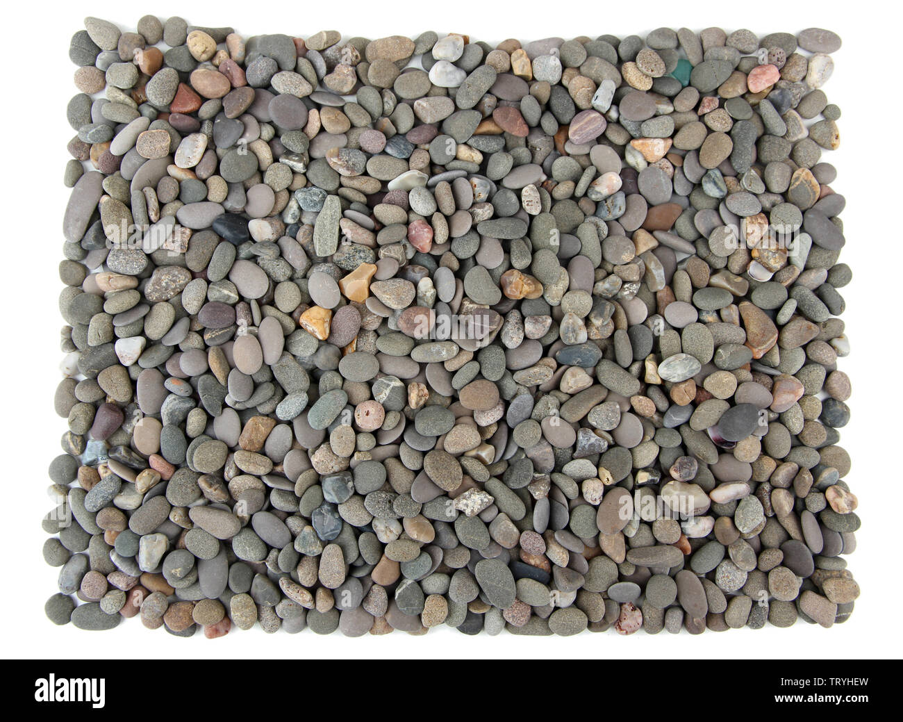 Small sea stones, isolated on white Stock Photo - Alamy