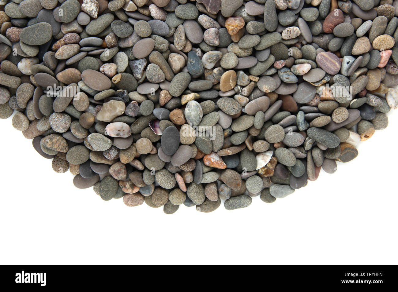 Small sea stones, isolated on white Stock Photo - Alamy