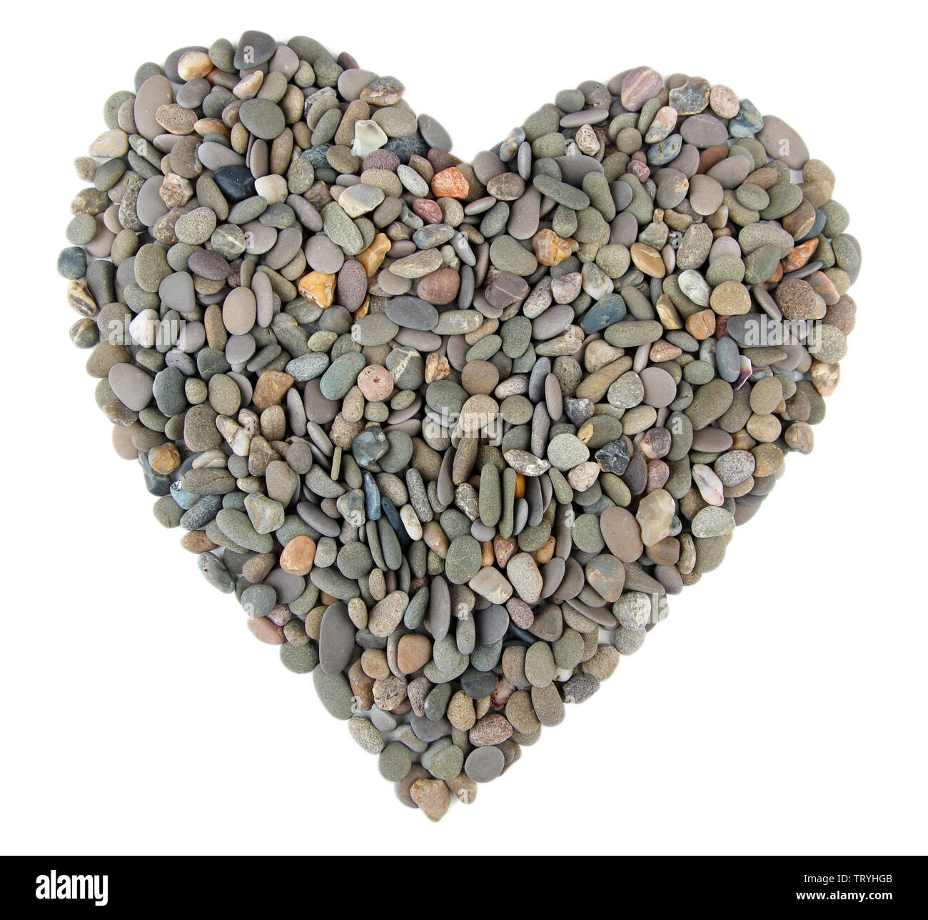 Beautiful heart of small sea stones, isolated on white Stock Photo - Alamy