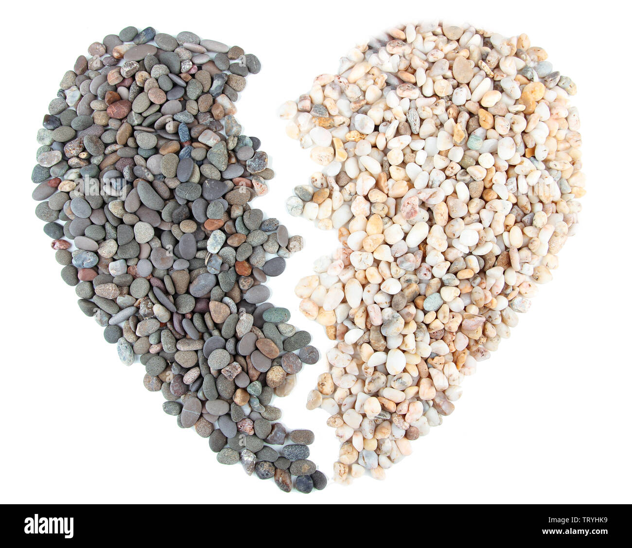 Beautiful broken heart of small grey and white sea stones, isolated on ...