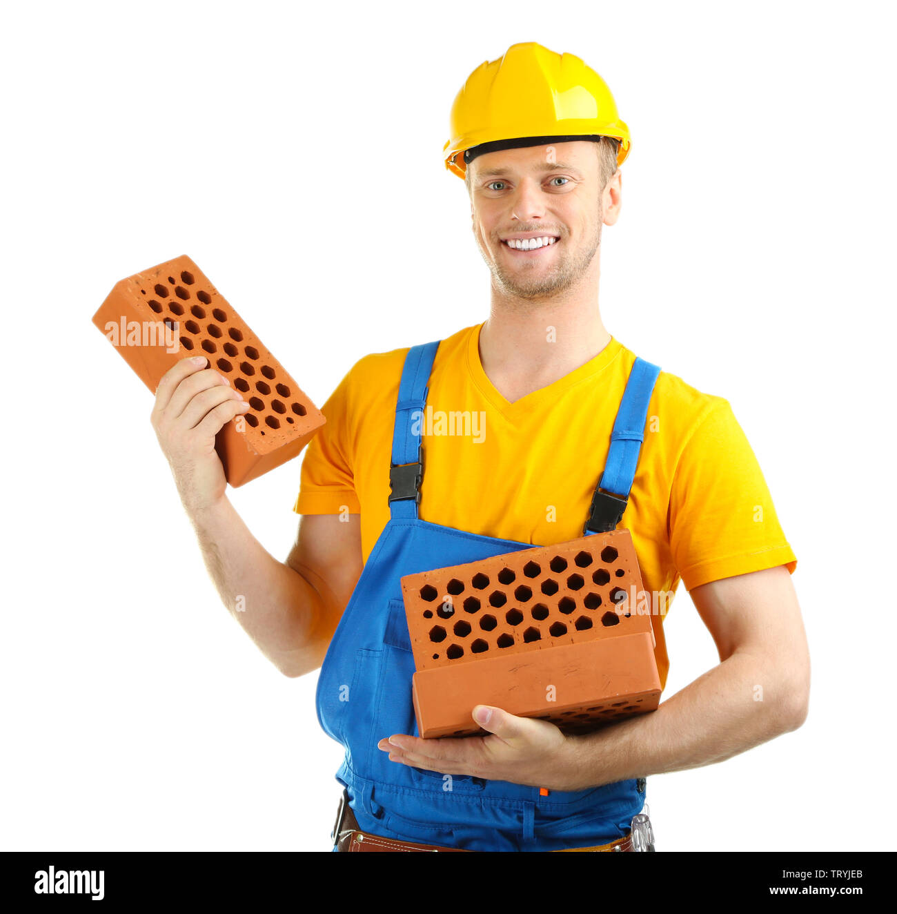 Portrait of young builder isolated on white Stock Photo - Alamy