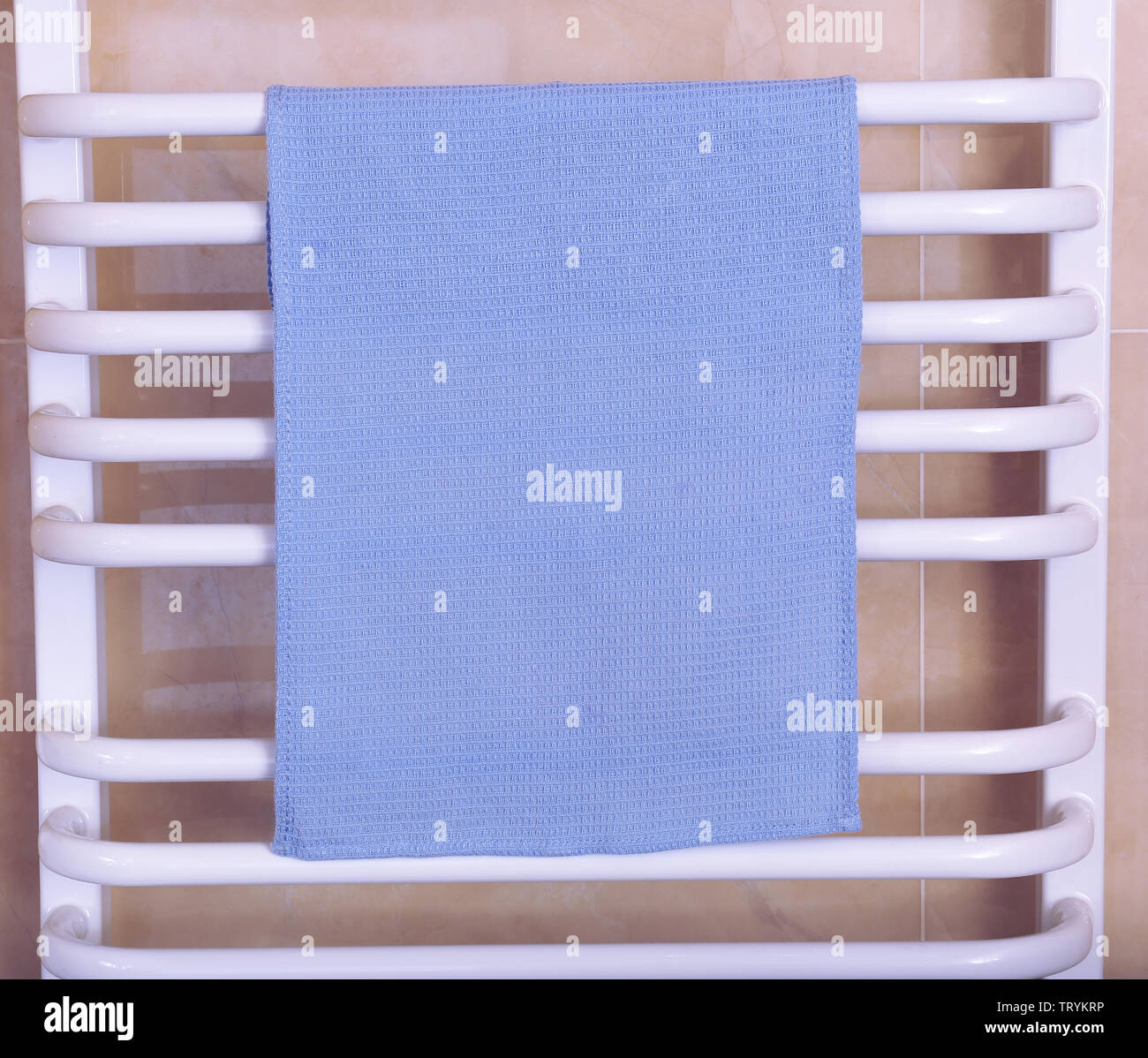 Color towel on radiator in bathroom Stock Photo - Alamy