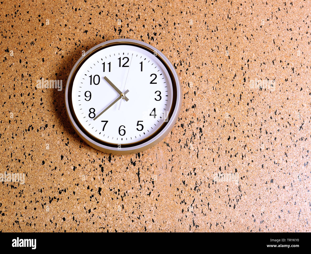 Clock on wall background Stock Photo - Alamy