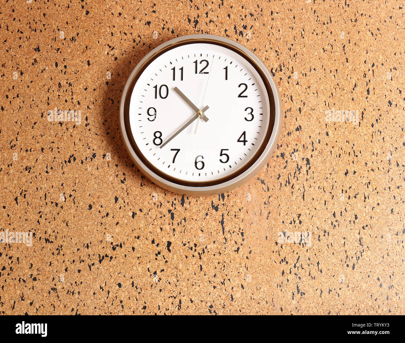 Clock on wall background Stock Photo - Alamy