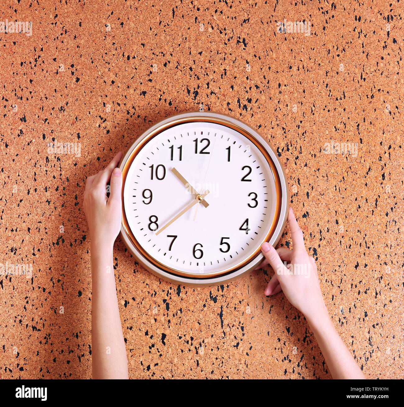 Clock on wall background Stock Photo - Alamy