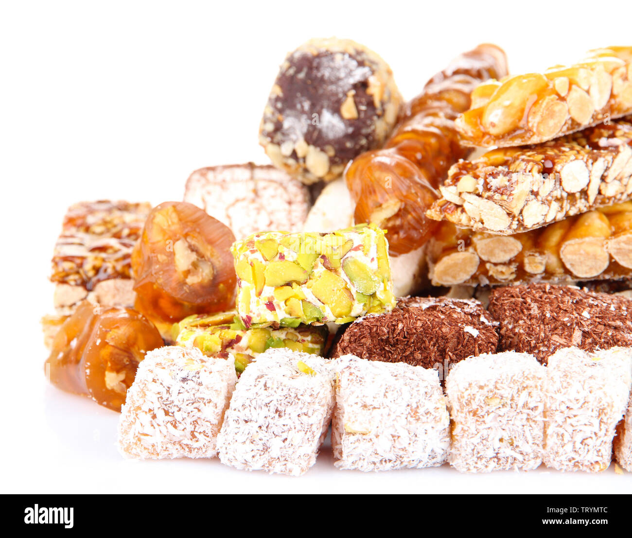 Tasty oriental sweets, isolated on white Stock Photo - Alamy