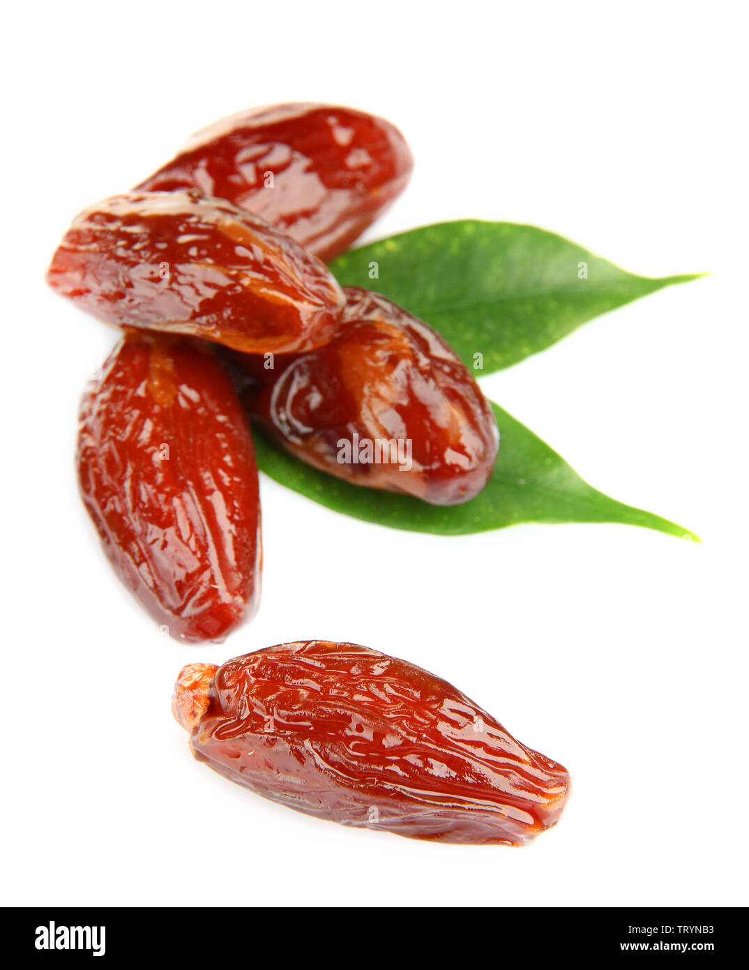 Dried dates isolated on white Stock Photo - Alamy