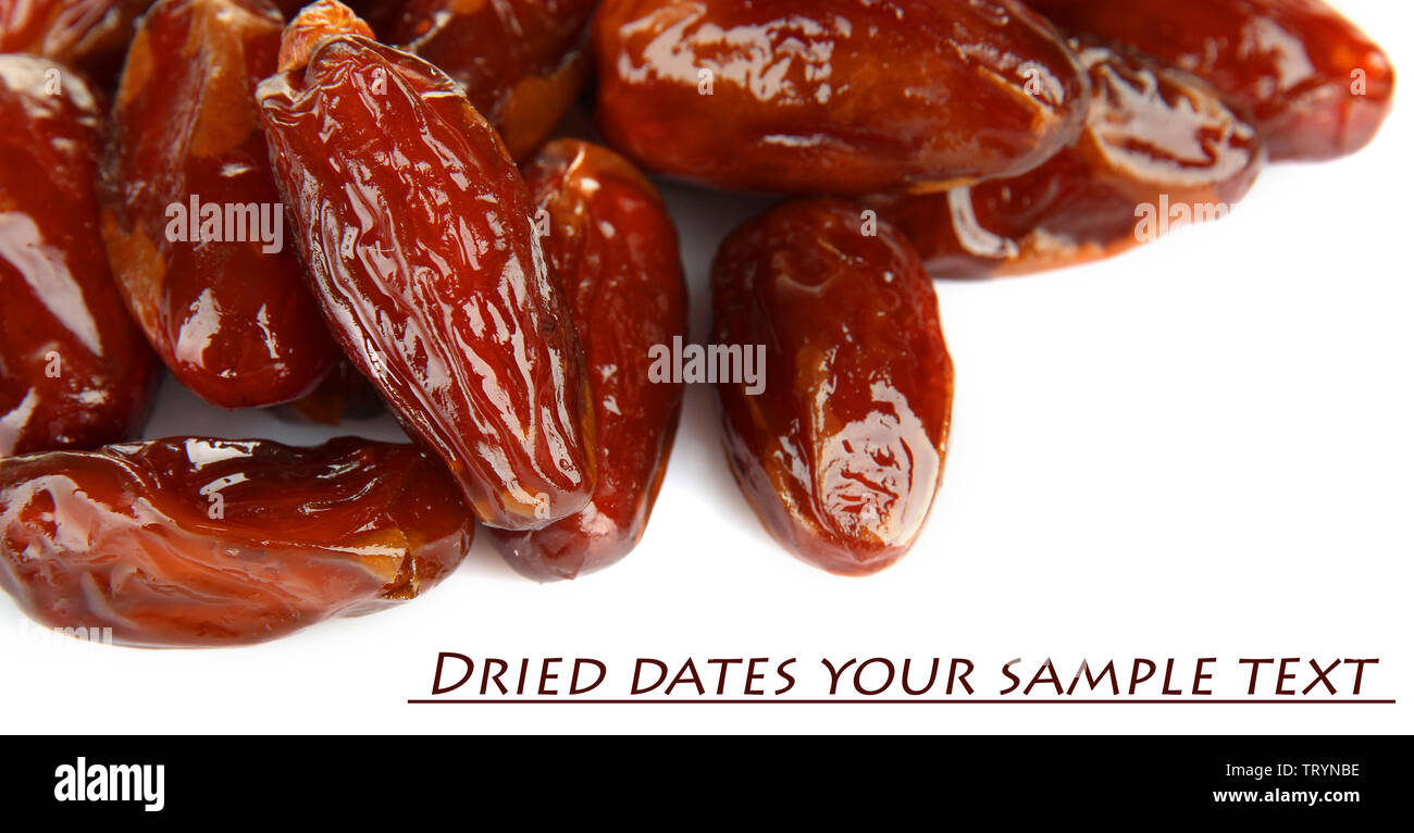 Dried dates isolated on white Stock Photo - Alamy