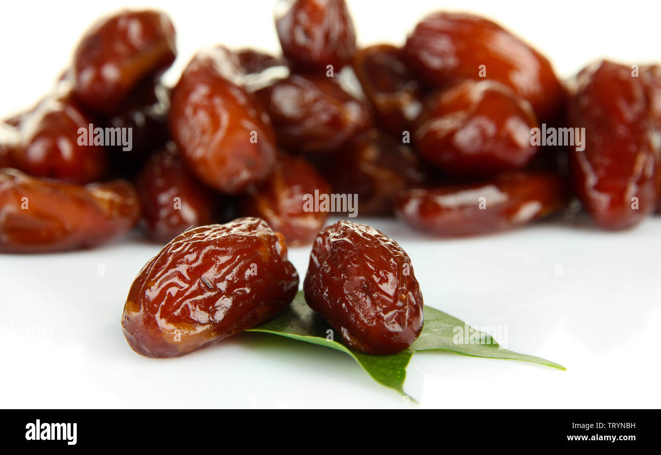 Dried dates isolated on white Stock Photo - Alamy