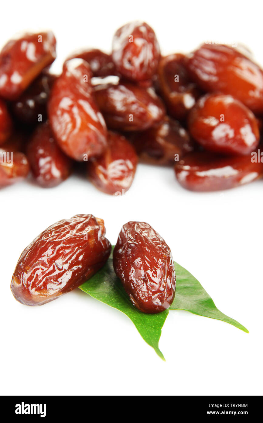 Dried dates isolated on white Stock Photo - Alamy