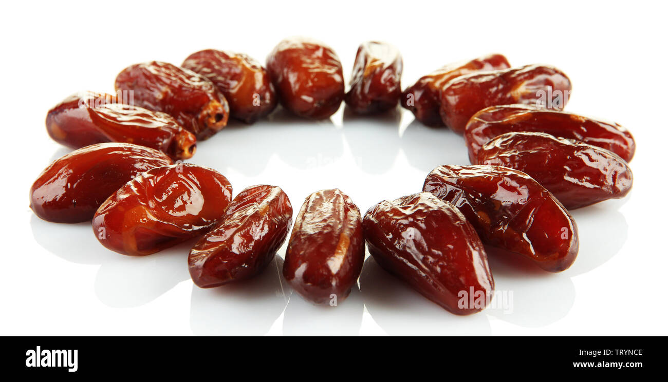 Dried dates isolated on white Stock Photo - Alamy