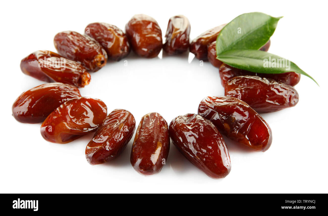 Dried dates isolated on white Stock Photo - Alamy
