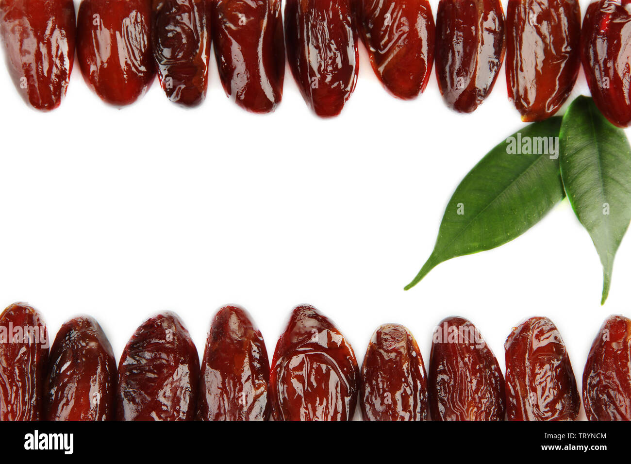 Dried dates isolated on white Stock Photo - Alamy