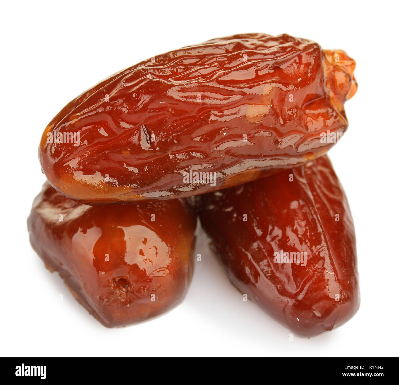 Dried dates isolated on white Stock Photo - Alamy