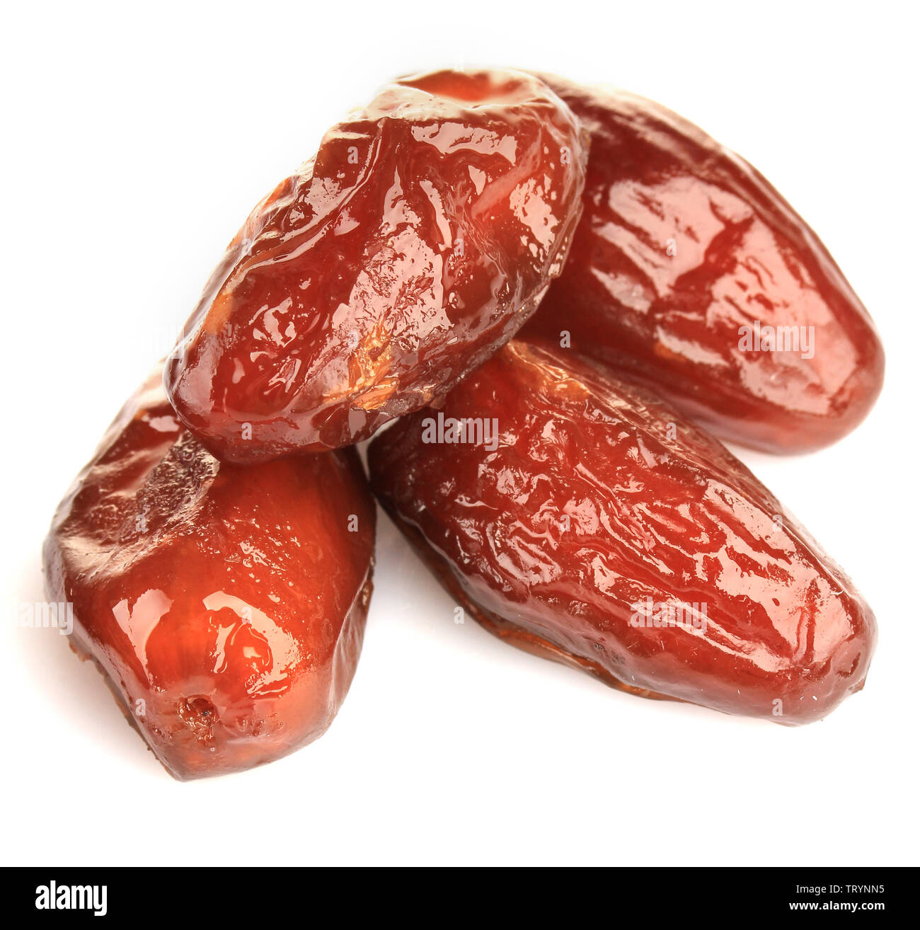 Dried dates isolated on white Stock Photo - Alamy