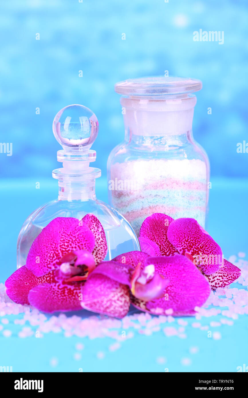 Beautiful spa setting with orchid on blue background Stock Photo - Alamy