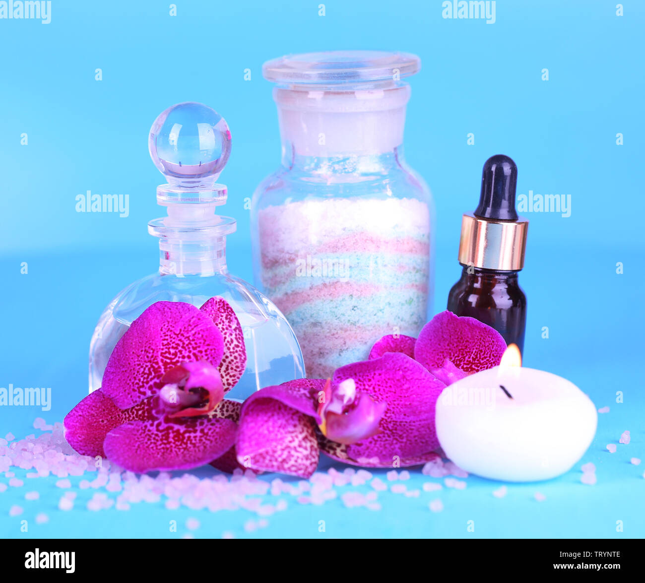 Beautiful spa setting with orchid on blue background Stock Photo - Alamy