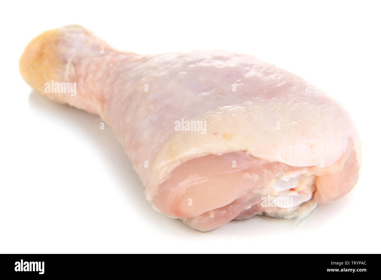 Raw chicken leg isolated on white Stock Photo - Alamy