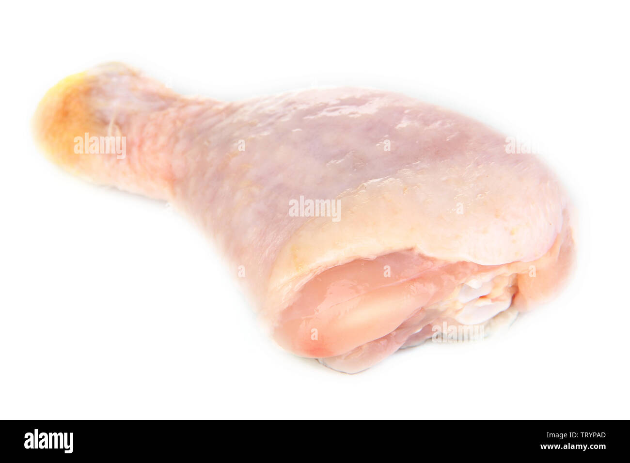 Raw chicken leg isolated on white Stock Photo - Alamy