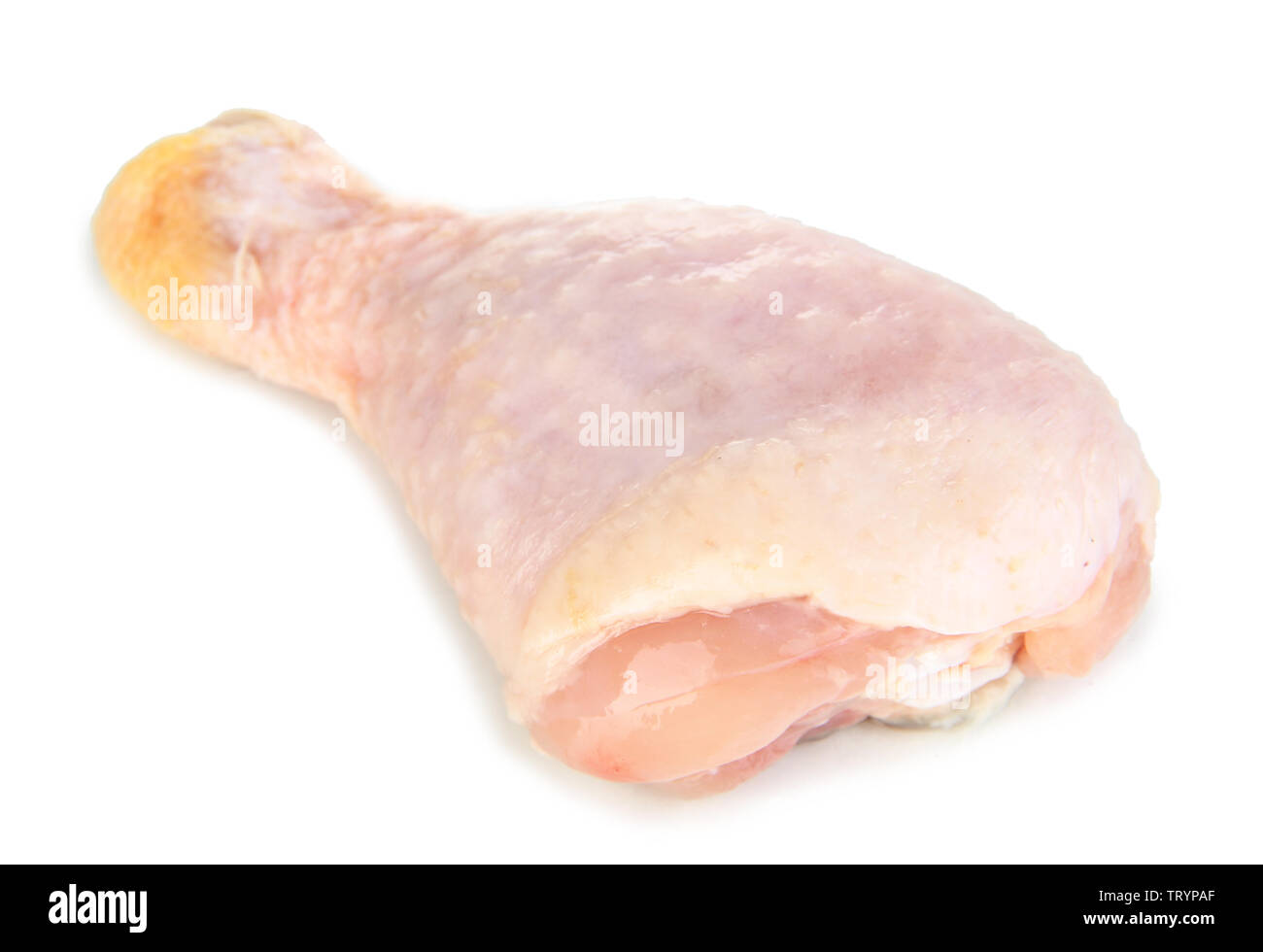 Raw chicken leg isolated on white Stock Photo - Alamy