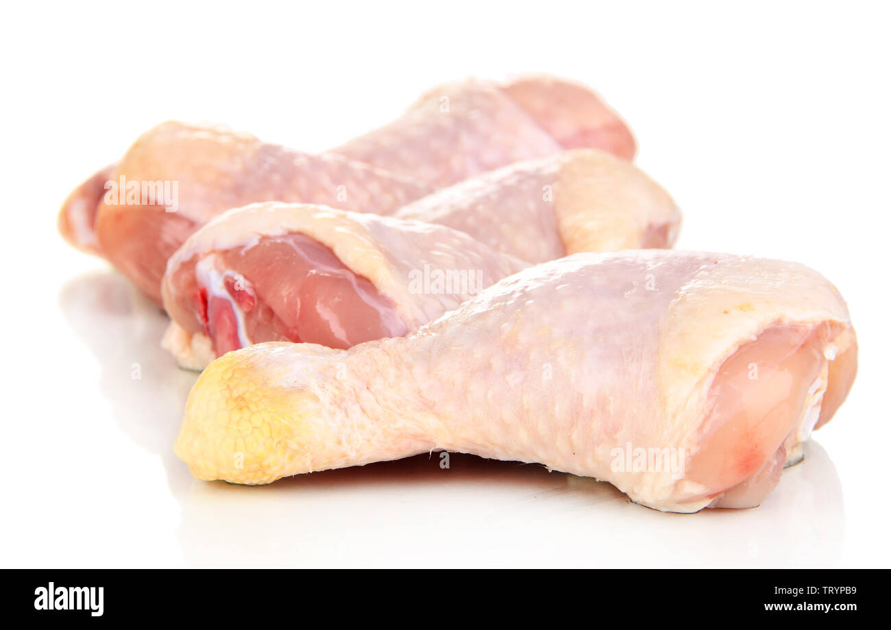 Raw chicken legs isolated on white Stock Photo - Alamy
