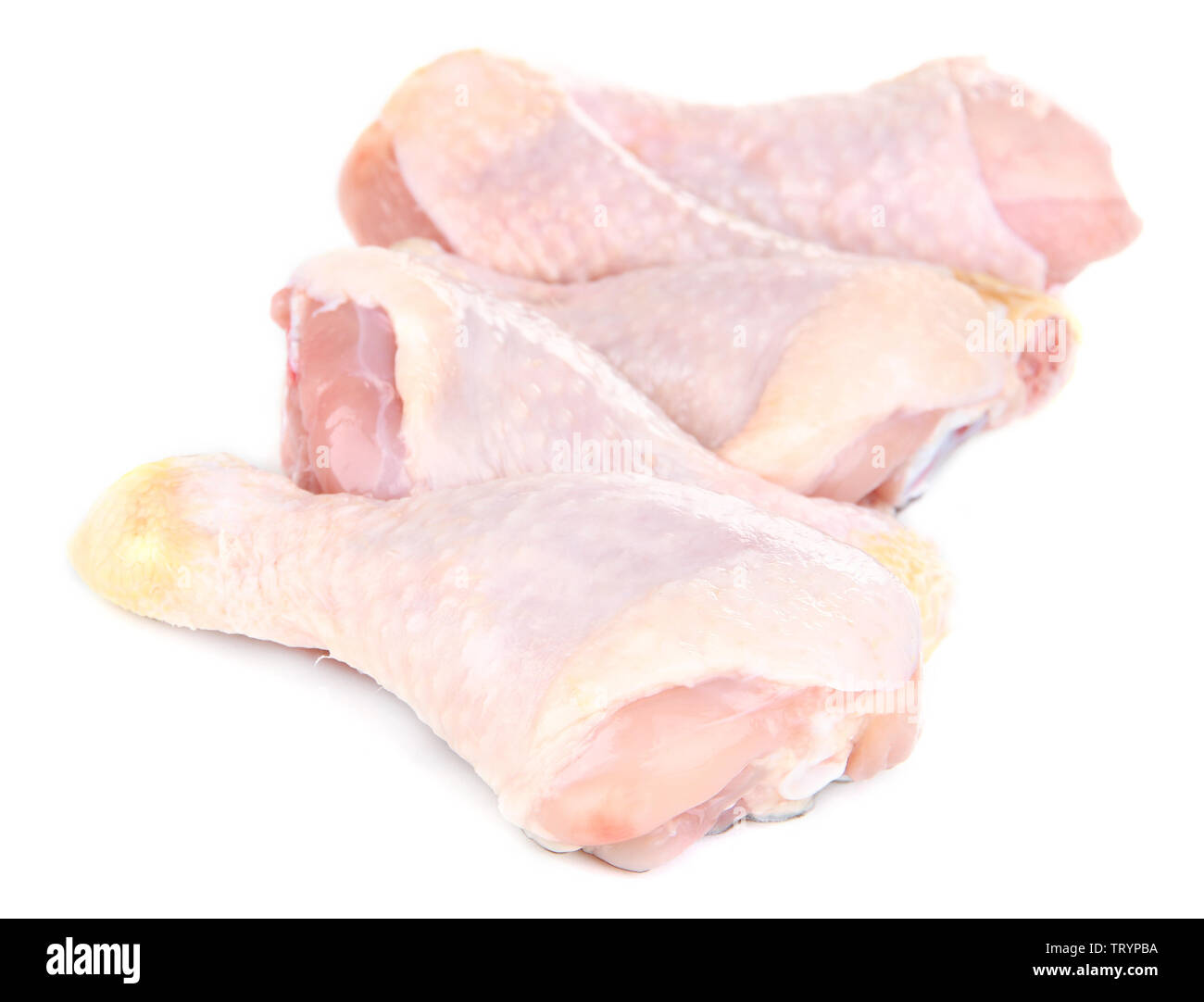 Raw chicken legs isolated on white Stock Photo - Alamy
