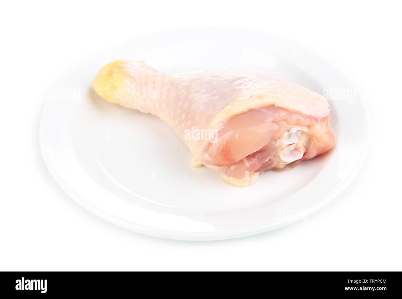 Raw chicken legs isolated on white Stock Photo - Alamy