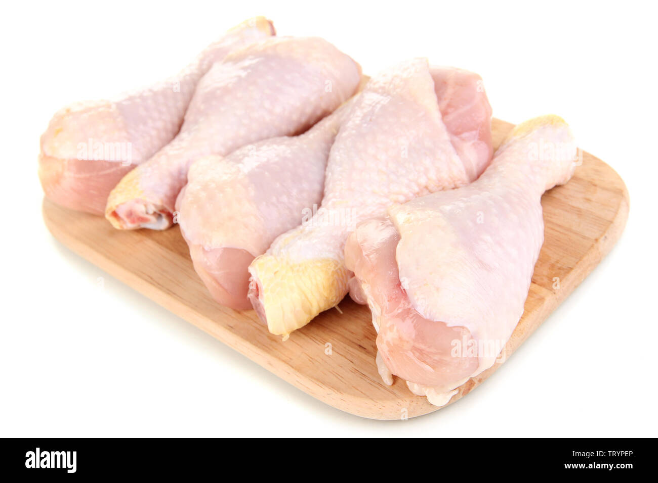Raw chicken legs isolated on white Stock Photo - Alamy